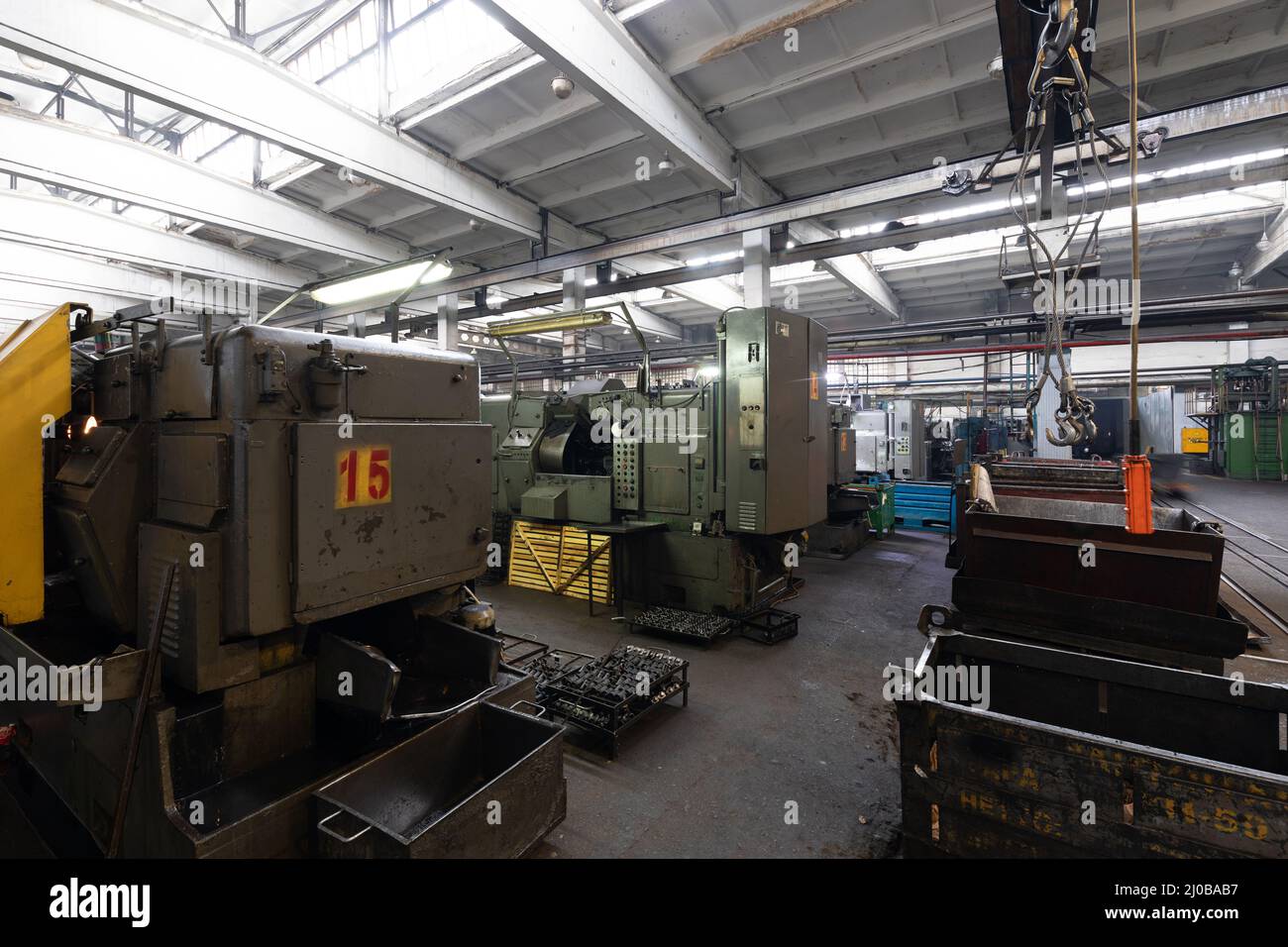 The interior of a big industrial building of factory with steel ...
