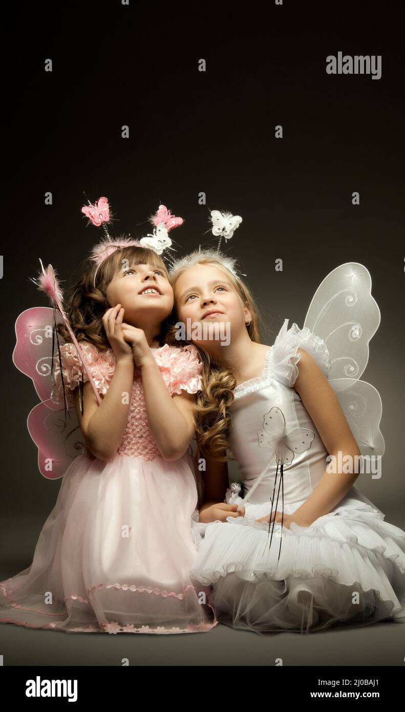 Angel with two children hi-res stock photography and images - Alamy