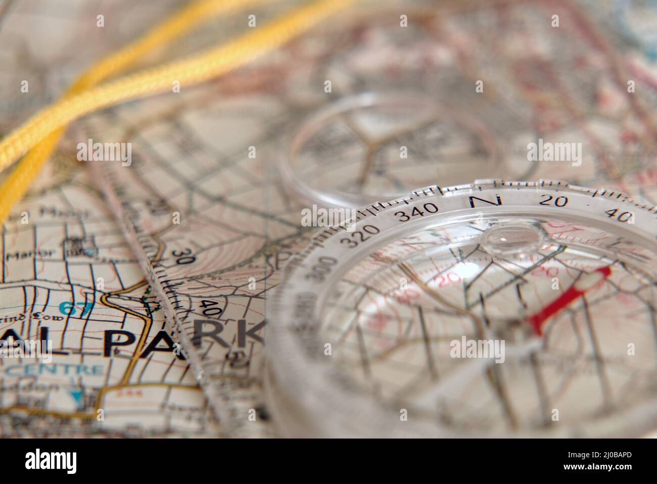 Compass on an Ordnance Survey map Stock Photo - Alamy