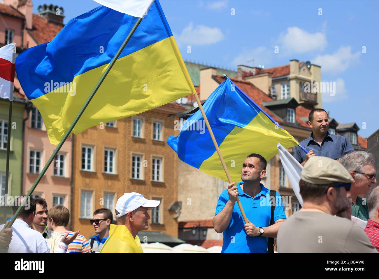 Warsaw, Poland - 27th of July, 2014: A man is holding a Ukrainian ...