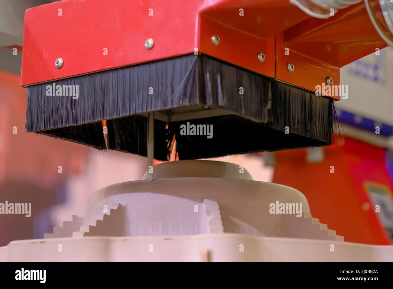 Milling machine cutting wooden workpiece from wood pulp at technology ...