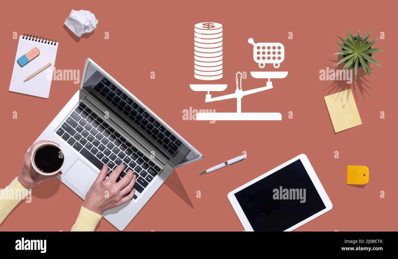 Top view of hands using laptop with symbol of inflation concept Stock ...