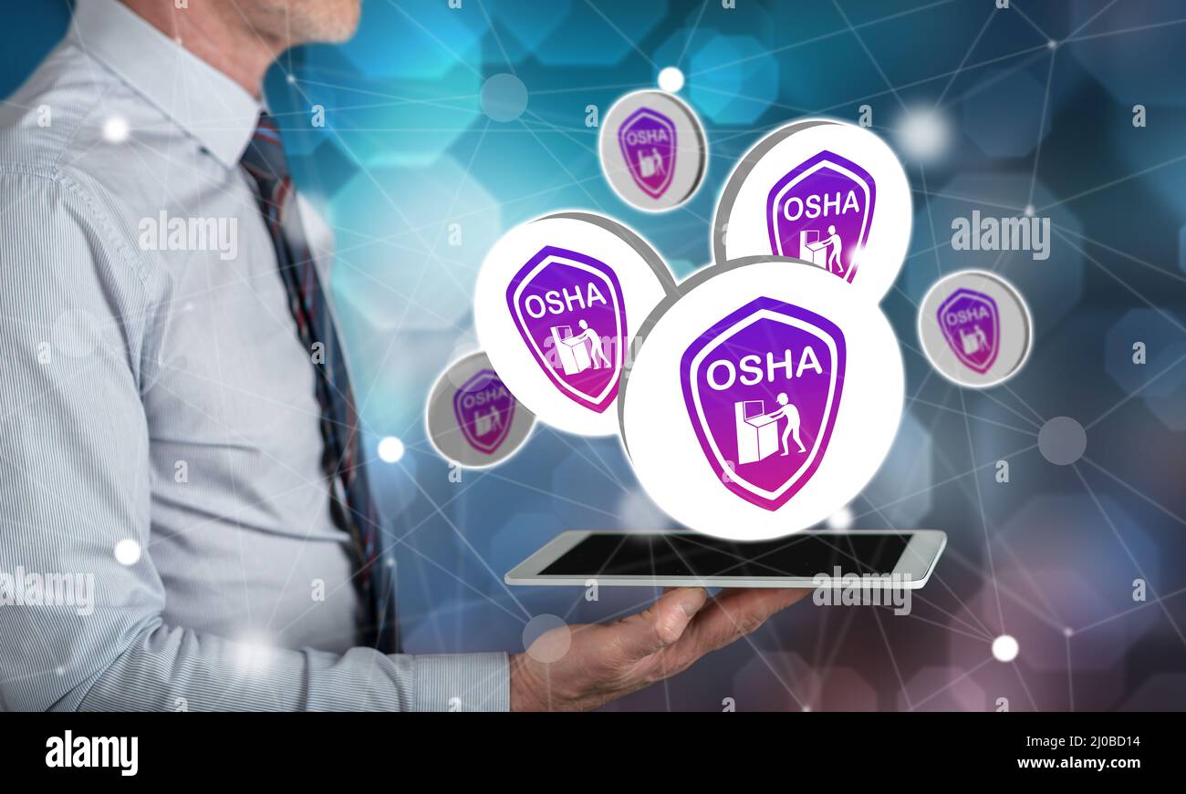 Osha concept above a tablet held by a man Stock Photo - Alamy