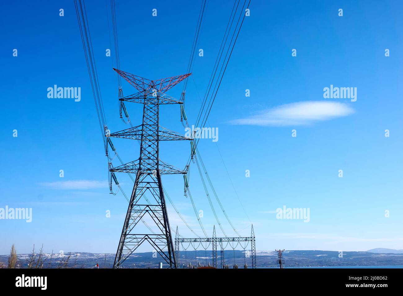 High voltage towers with hanging power lines Stock Photo - Alamy