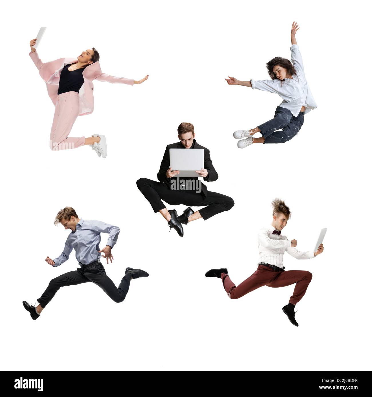 Emotional office workers jumping and dancing in casual clothes and ...