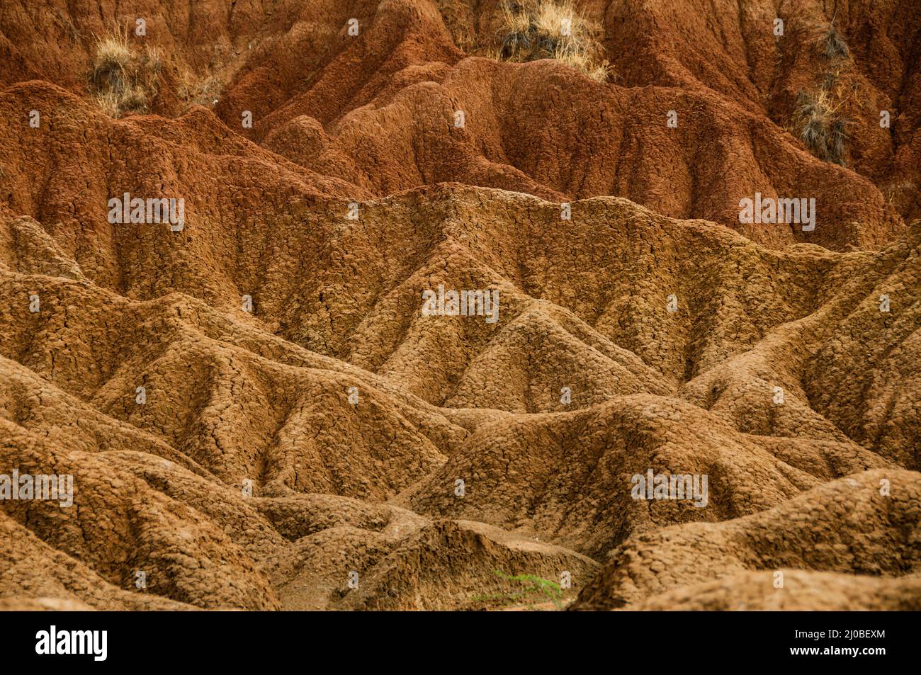 Detail of Drought red orange sand stone rock formation in Tatacoa ...