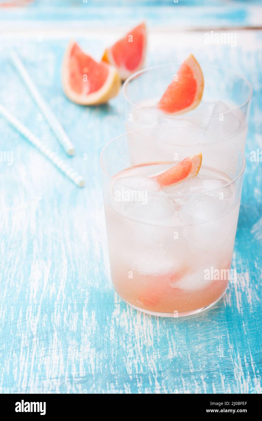 Juicy grapefruit cocktail with ice and alcohol Stock Photo - Alamy