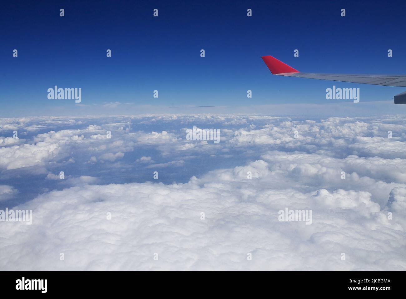 View of clouds from an airplane window Stock Photo - Alamy