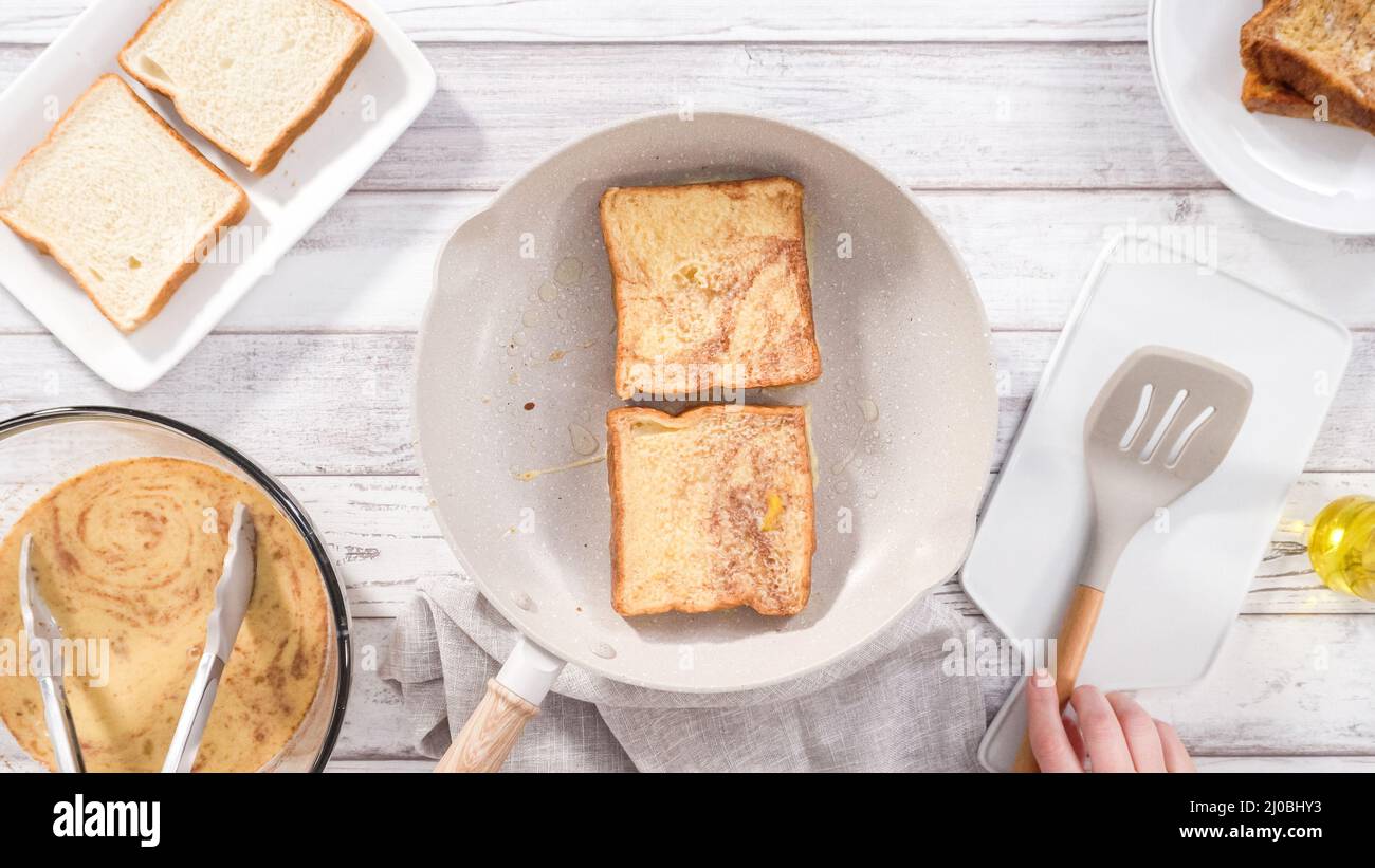 Step by step. Frying french toast in a nonstick frying pan Stock Photo ...