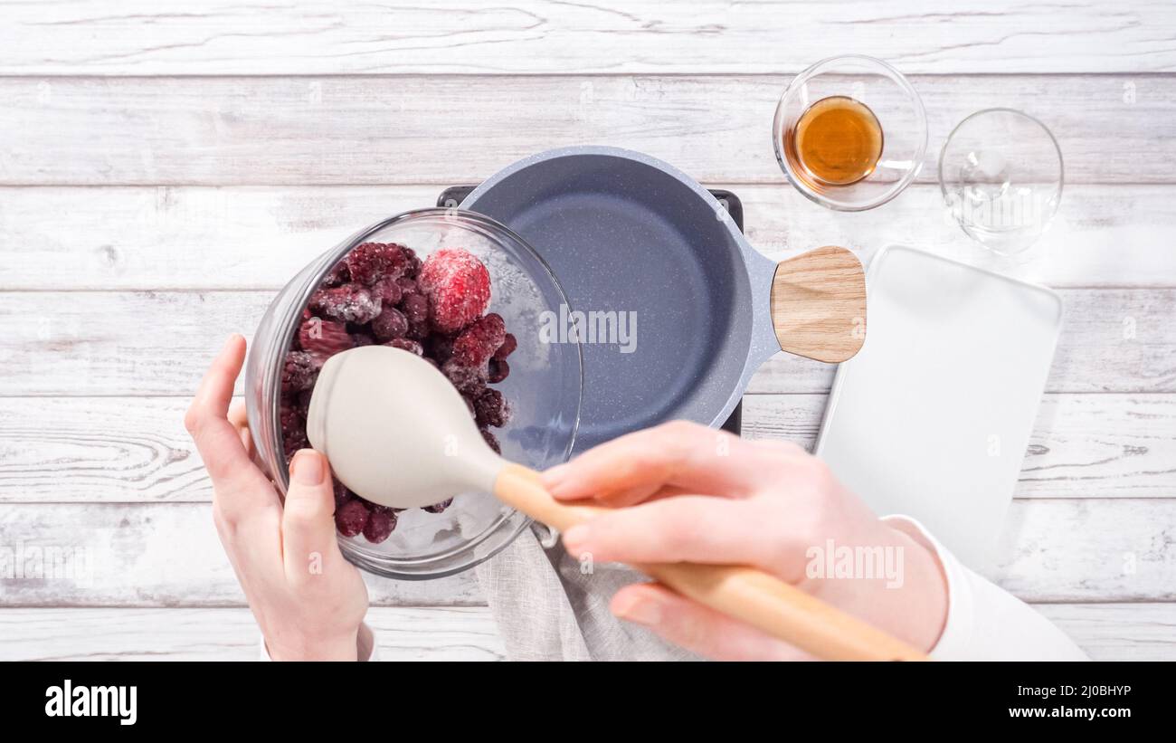 Step by step. Preparing mixed berry compote from frozen berries in a ...