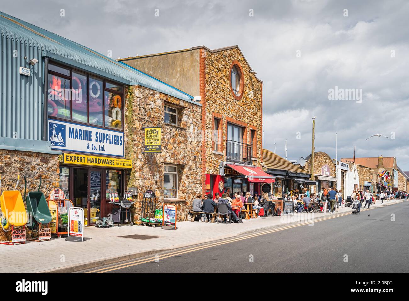 Dublin, Ireland, Aug 2019 People enjoying nice weather in Howth dining ...