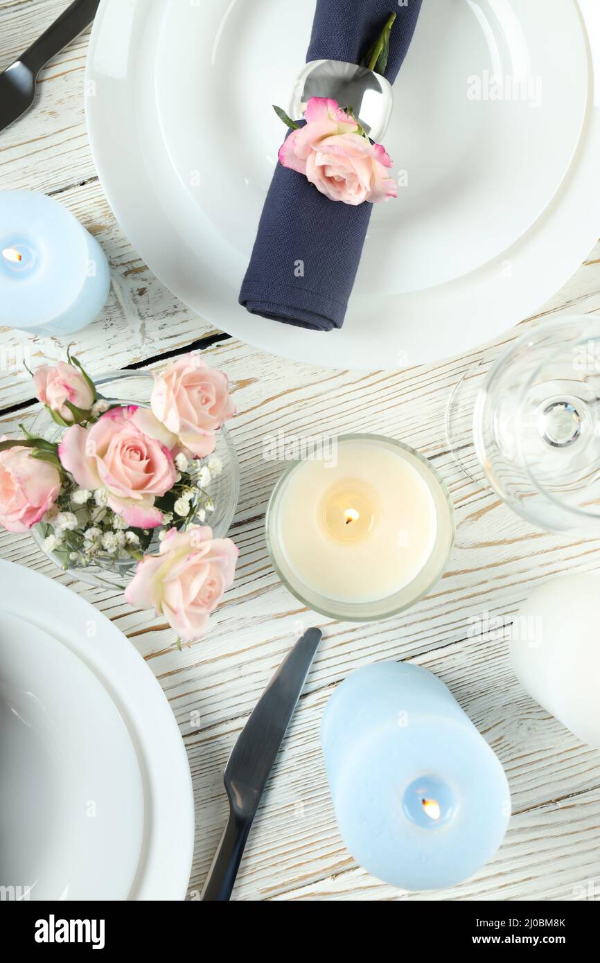 Concept of table setting with aroma candles Stock Photo - Alamy