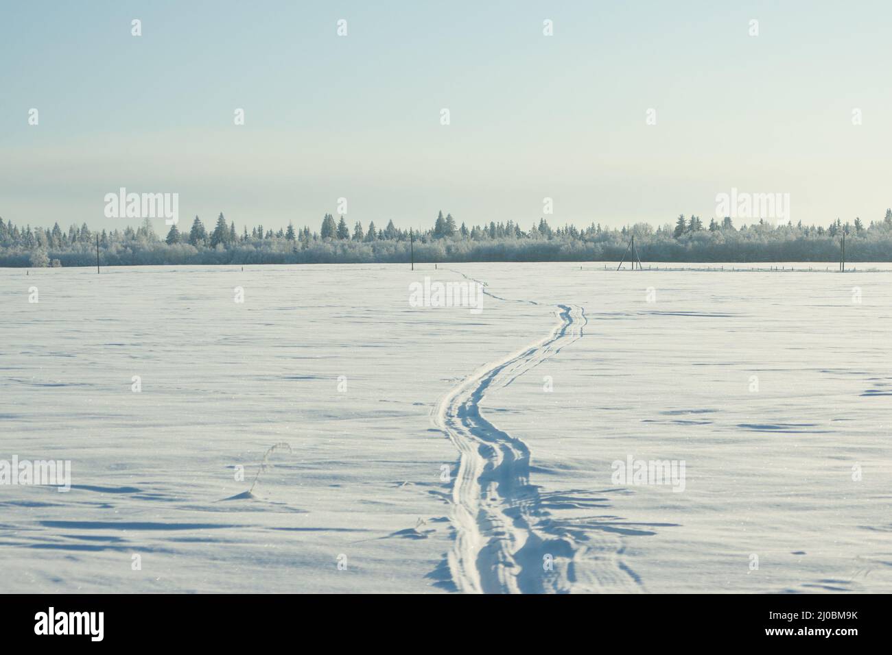 Winter landscape with a path in the snow Stock Photo - Alamy