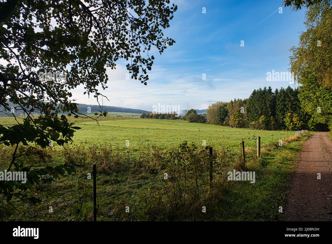 landscape with hills, fields, meadows, and agriculture. Hiking in ...