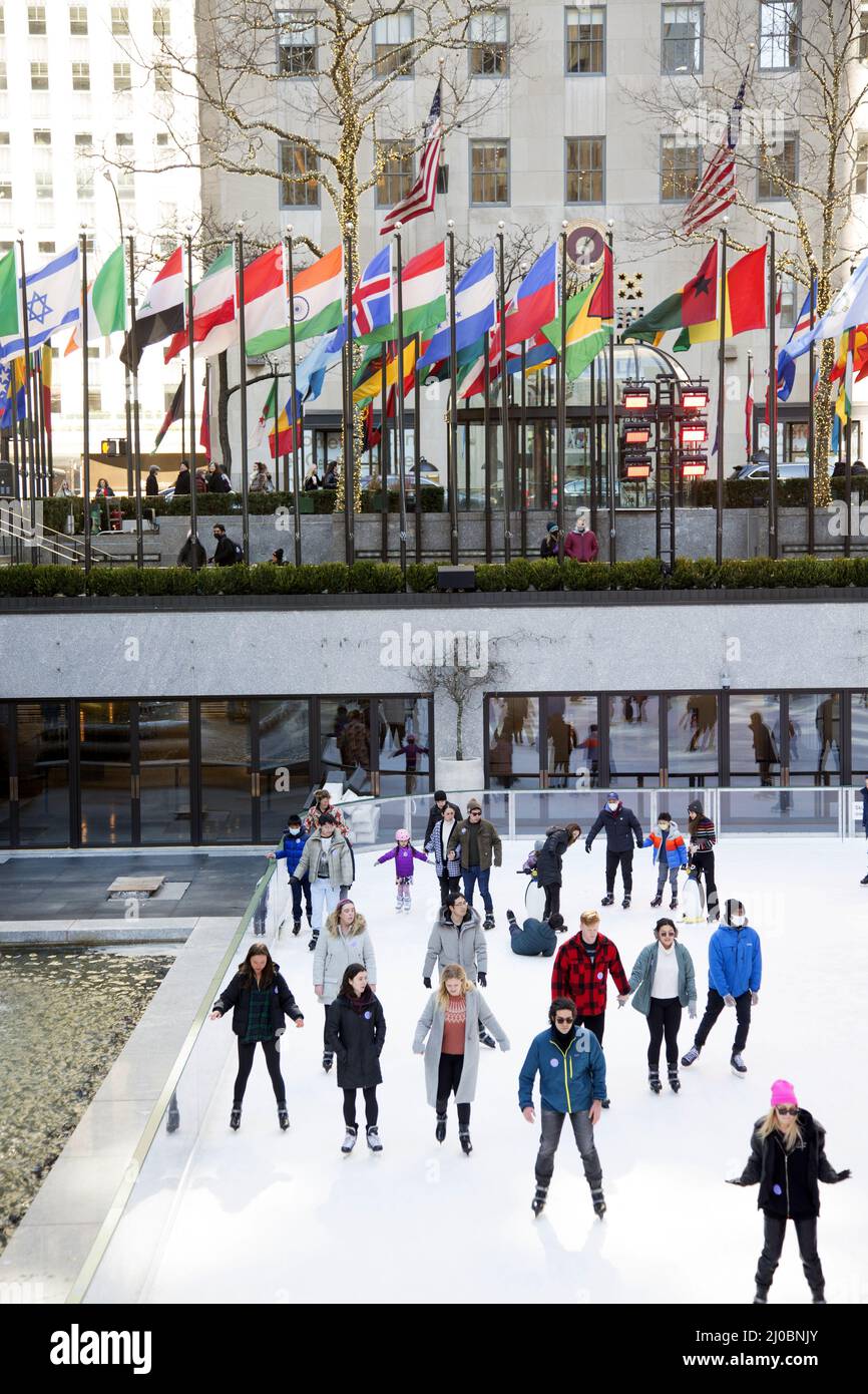 The ice-skating rink at Rockefeller Center is a popular tourist ...
