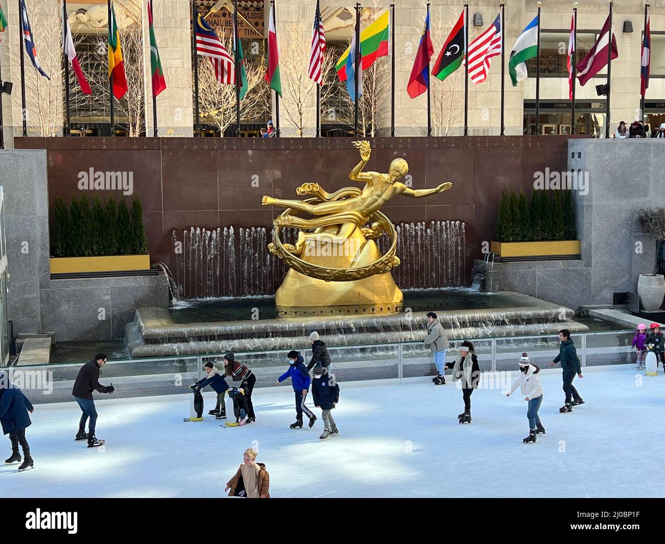 People enjoy ice skating in midtown Manhattan at Rockefeller Center ...