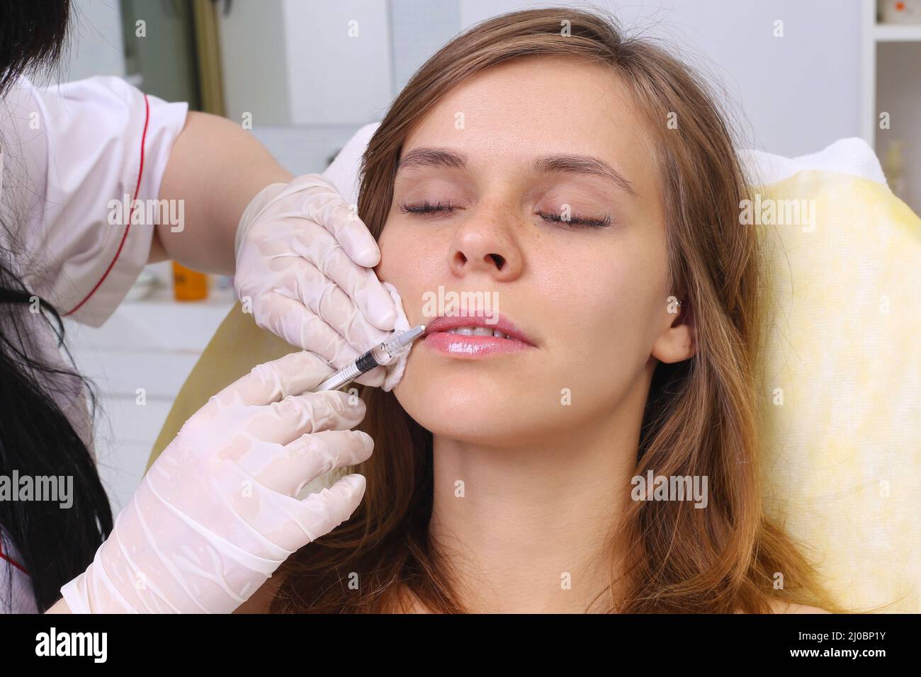 Procedure filler injection in beauty clinic Stock Photo - Alamy