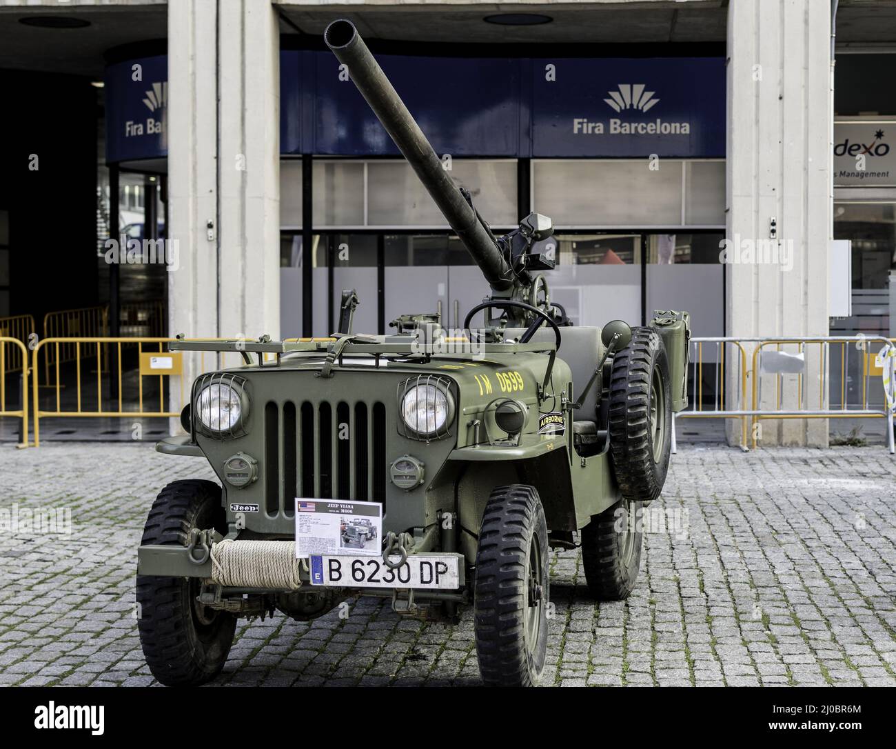 Old American off road vehicle used in World War II driving in the city ...