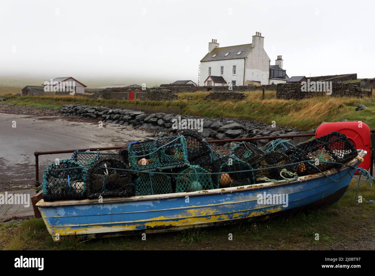 Fishing boat with lobster traps, Shetland Islands, Scotland Stock Photo ...
