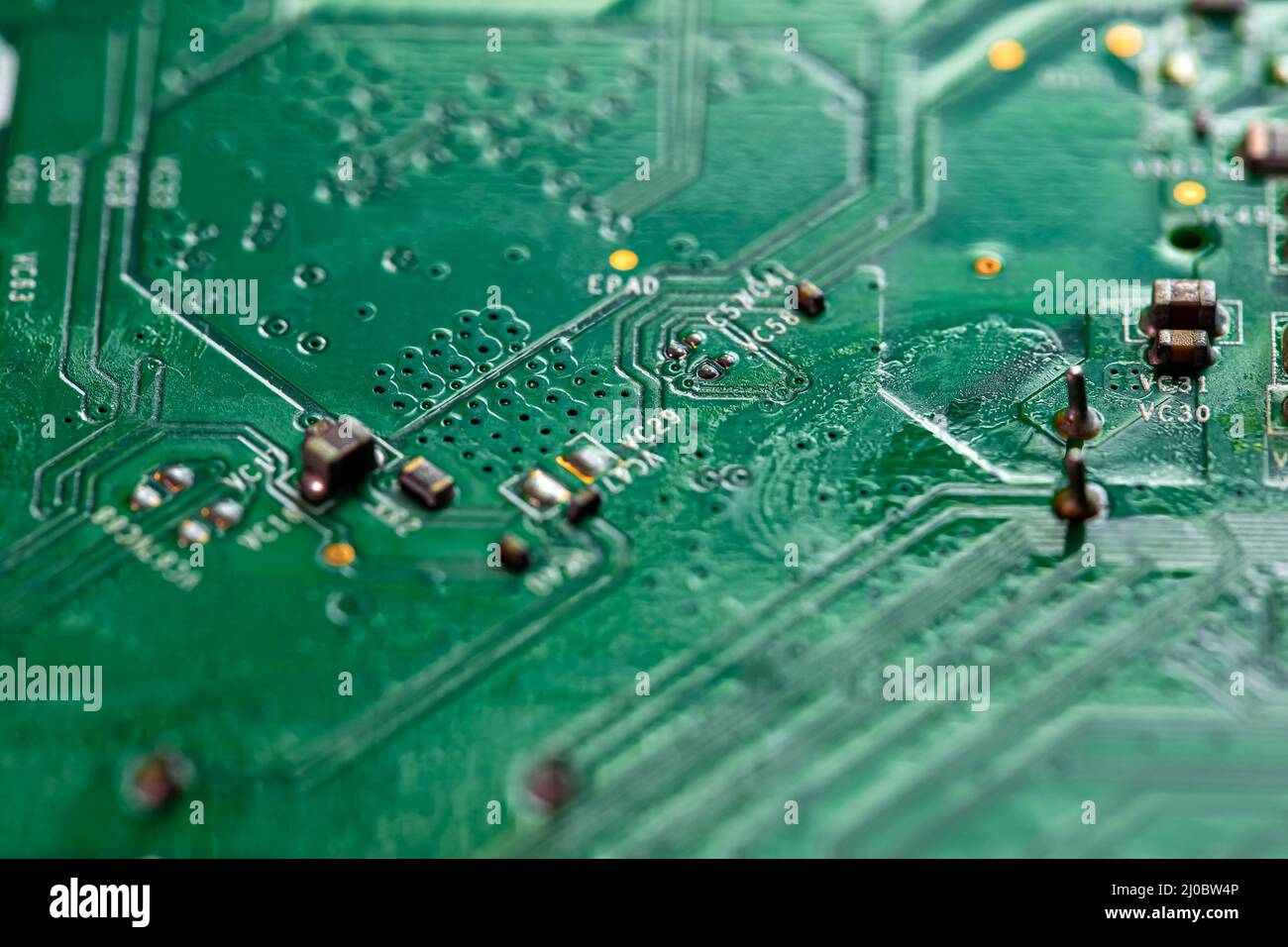 Macro Close up of printed wiring on PC circuit board of modem router ...
