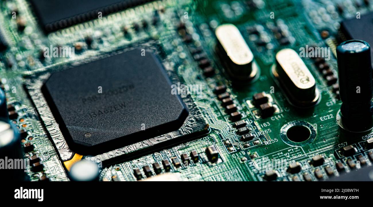Macro Close up of components and microchips on PC circuit board of ...