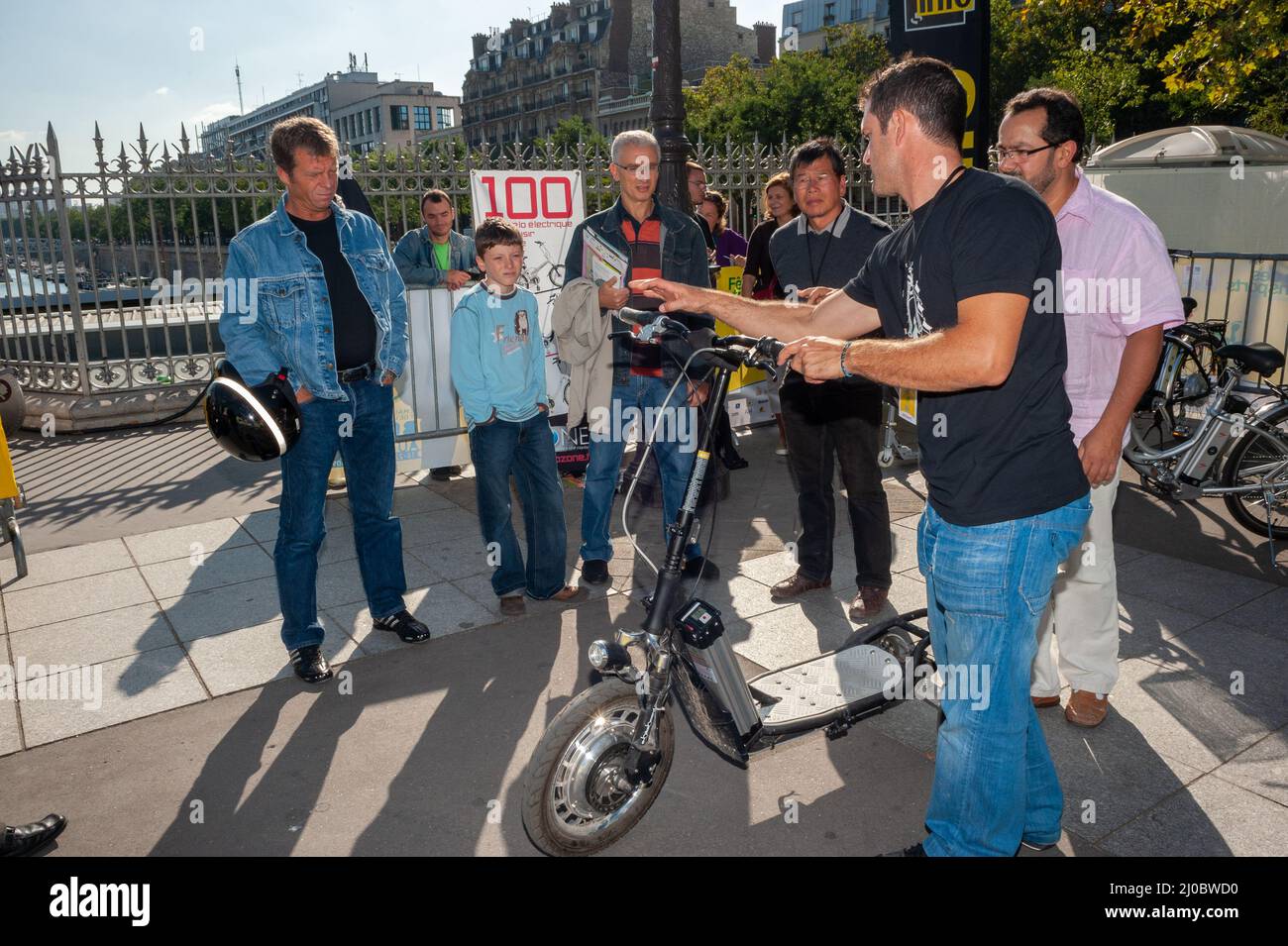 Paris, France, French Salesman Showing Group of People Electric Scooter ...