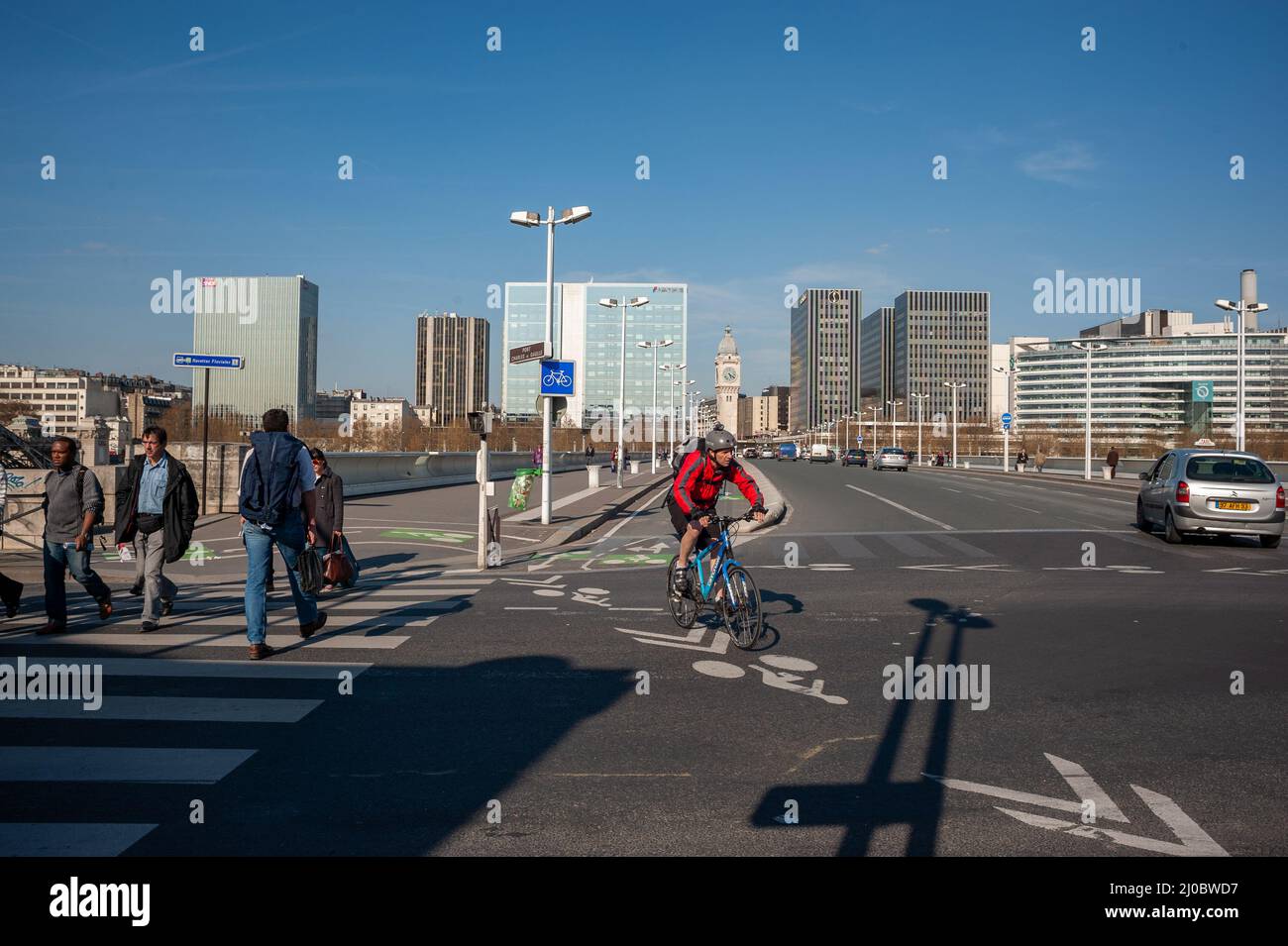 Paris, France, Man Riding Bicycle, Cycling on Street, Bridge, Pont ...