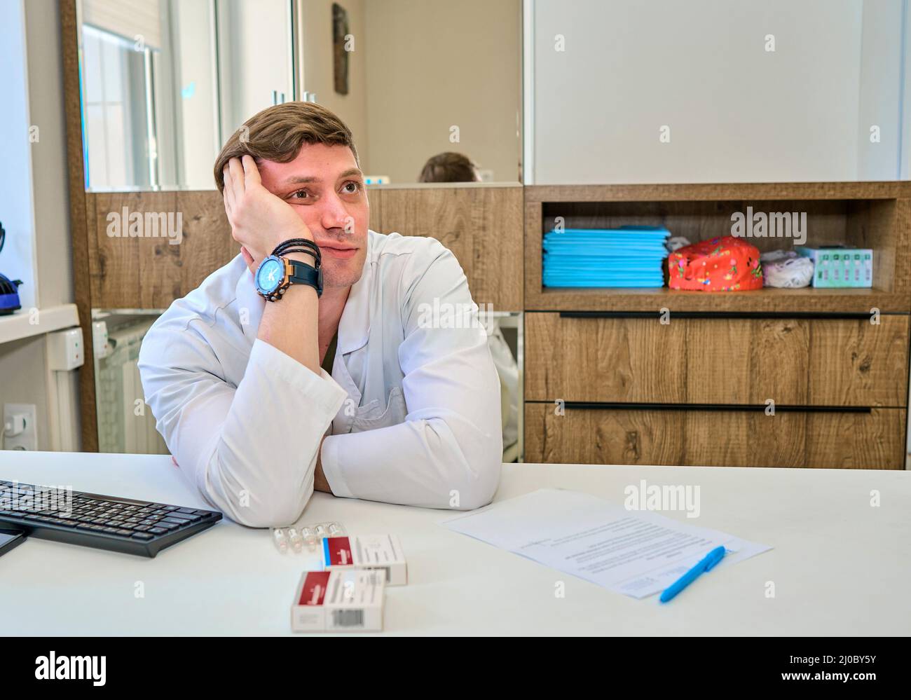Doctor sleeping at desk hi-res stock photography and images - Alamy