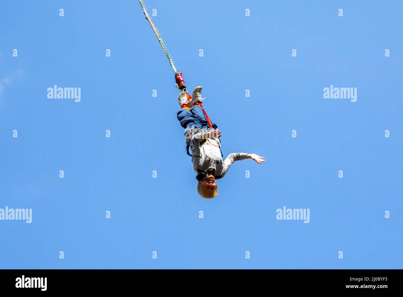 Old woman bungee jumping Stock Photo - Alamy