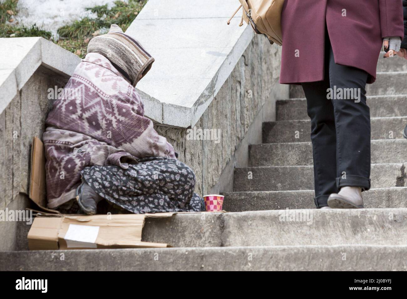 Homeless gypsy woman begging for money Stock Photo - Alamy