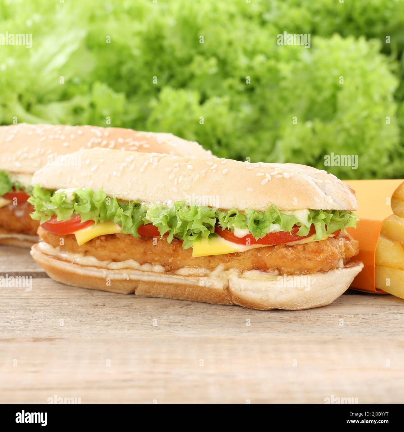 Chickenburger chicken burger hamburger and fries Stock Photo - Alamy