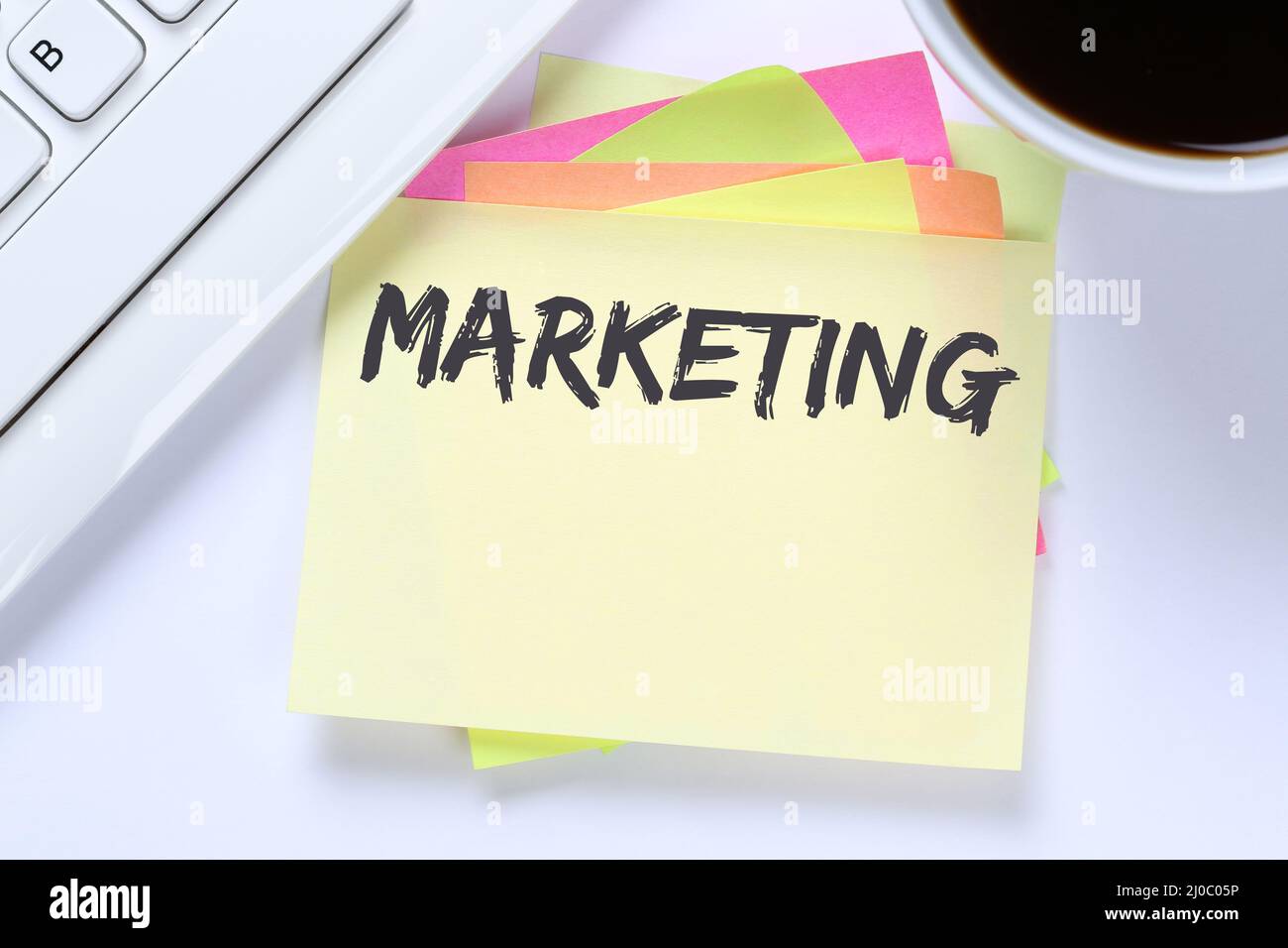 Marketing advertising company office business desk Stock Photo - Alamy