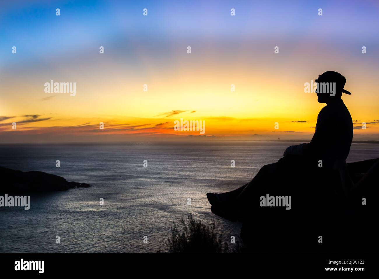 Boy at beach sunset hi-res stock photography and images - Alamy