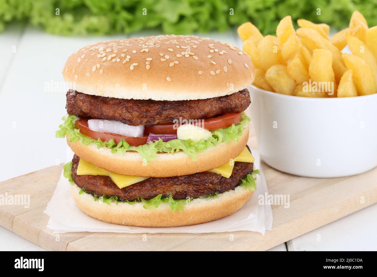 Doubleburger Double burger hamburger with fries Stock Photo - Alamy