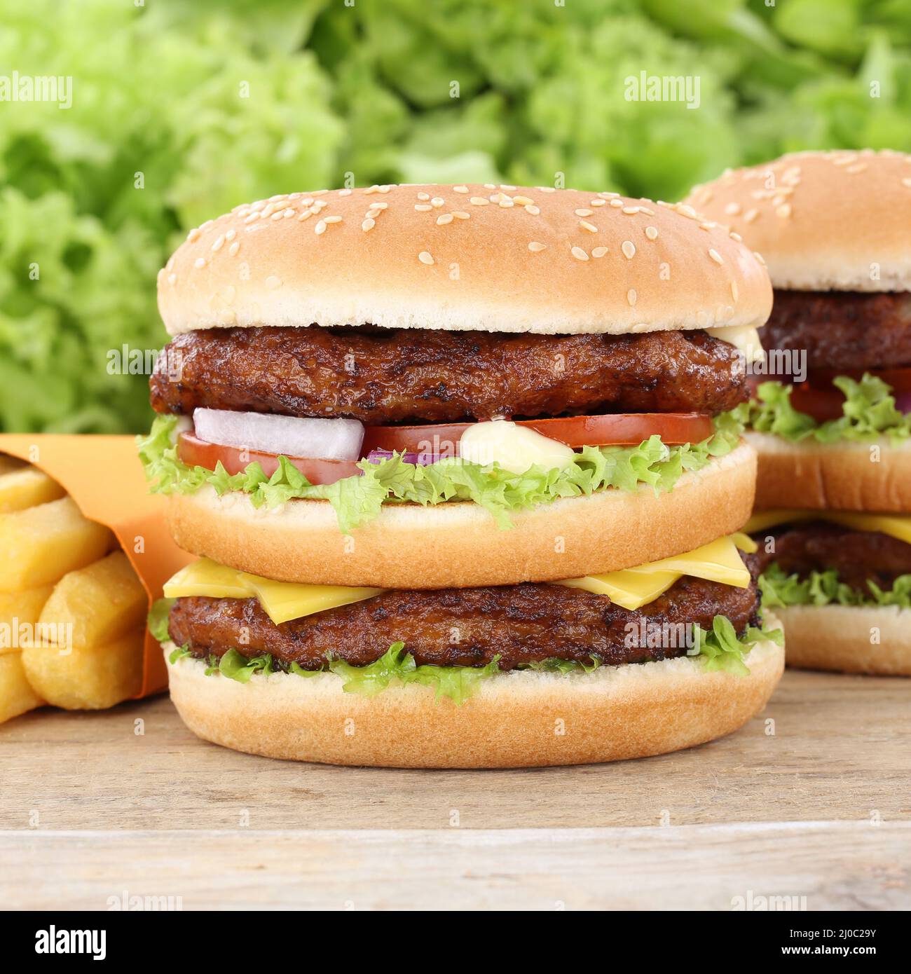 Doubleburger Double burger hamburger and fries Stock Photo - Alamy