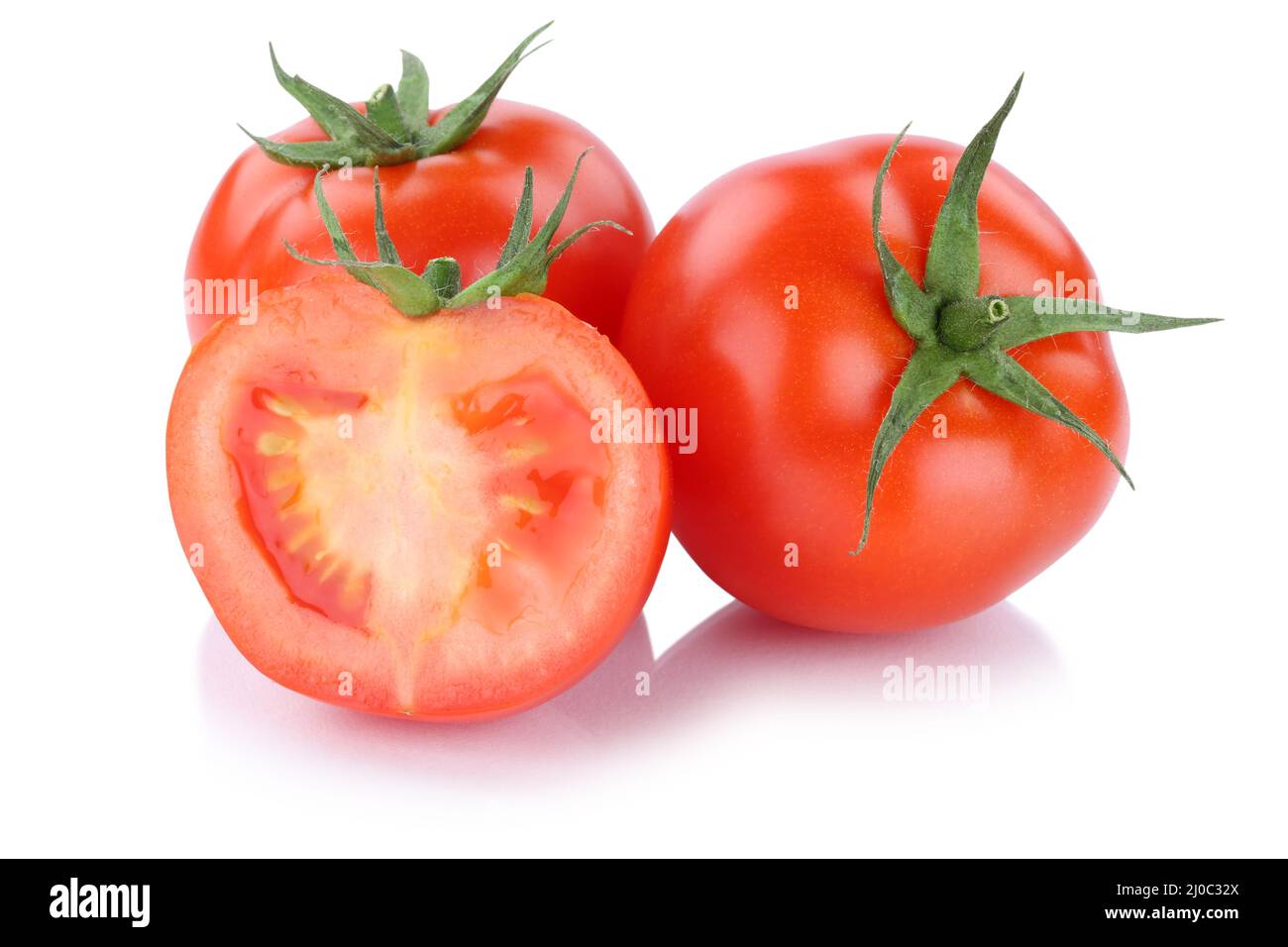 Tomatoes tomato cut fresh vegetable exempted isolated Stock Photo - Alamy
