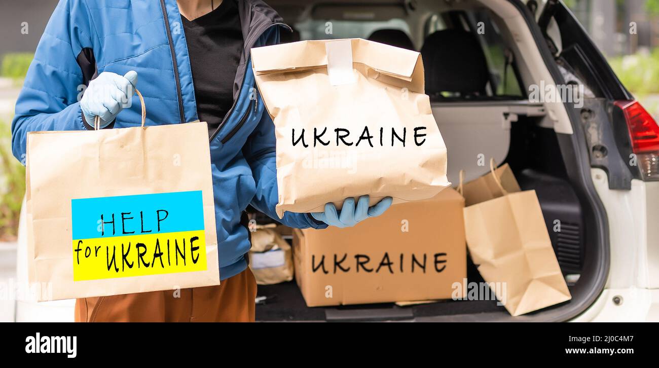 Collecting a humanitarian food set to help people who suffered during ...