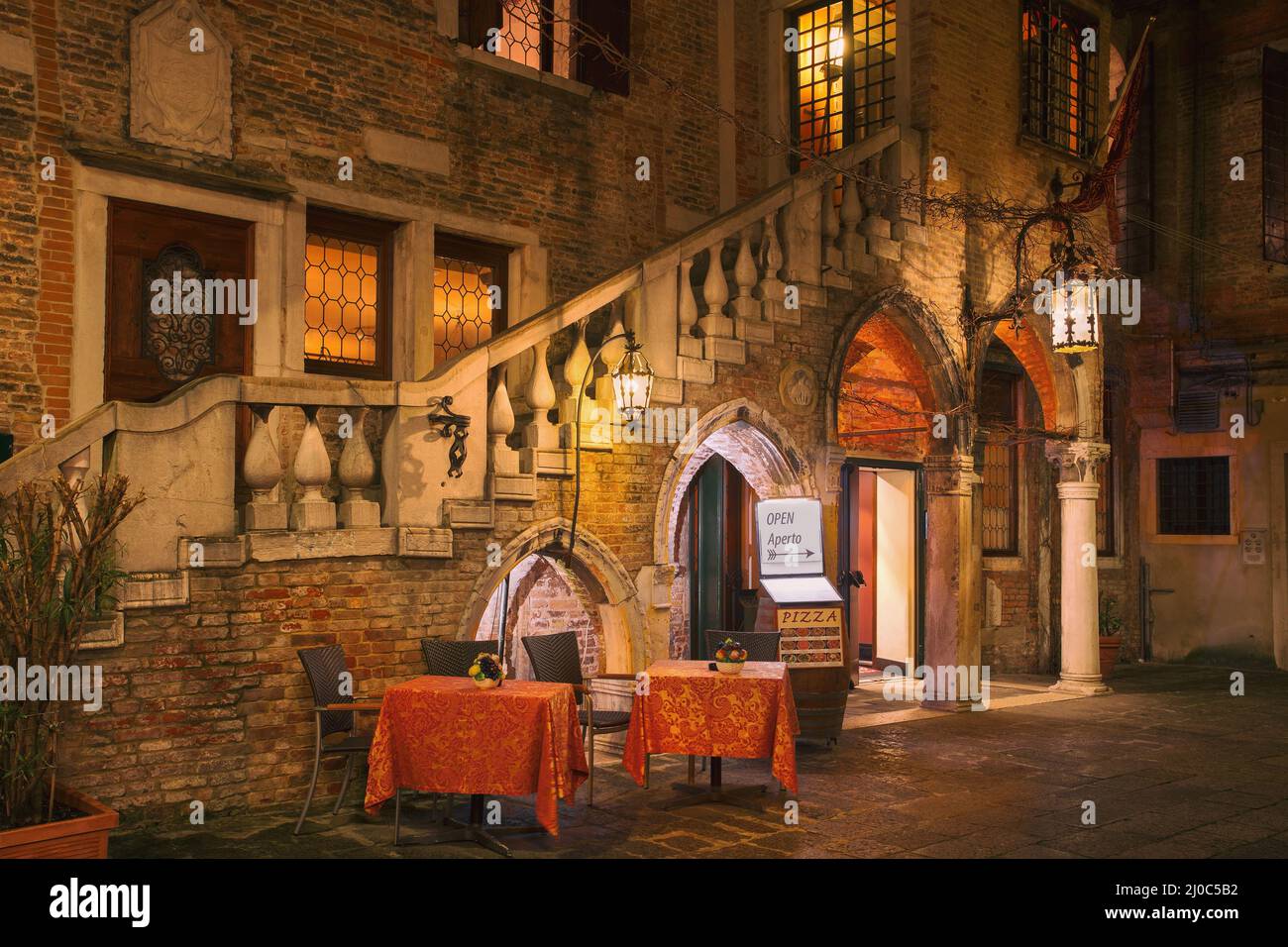 The picturesque restaurant in the evening light in Venice, Italy Stock ...