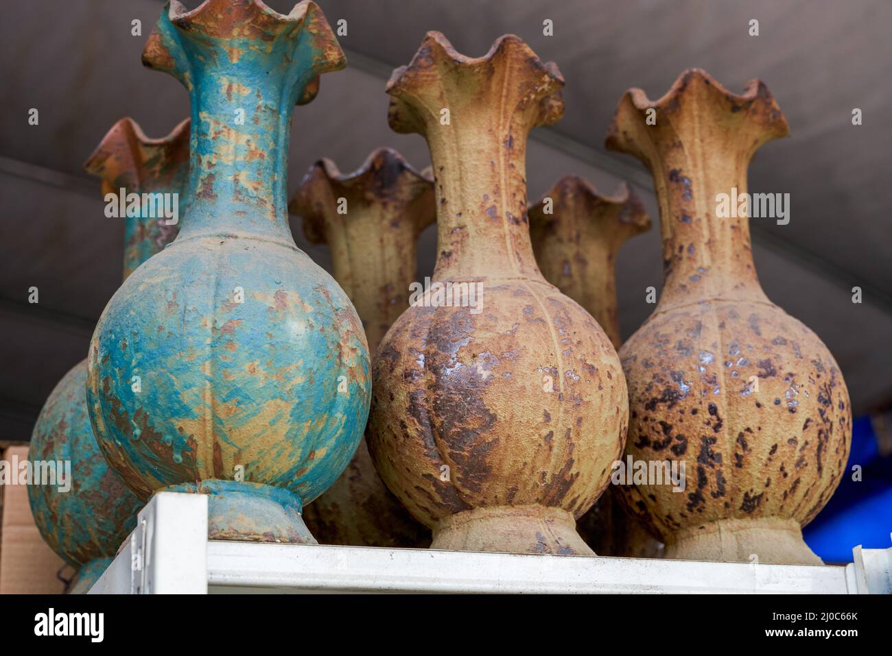 Three old rusty vases close-up Stock Photo - Alamy
