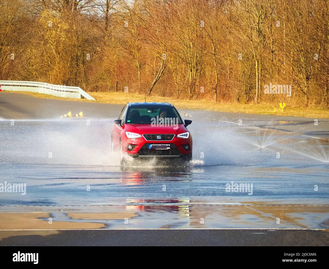 ADAC driving safety training aquaplaning on a practice area Stock Photo ...