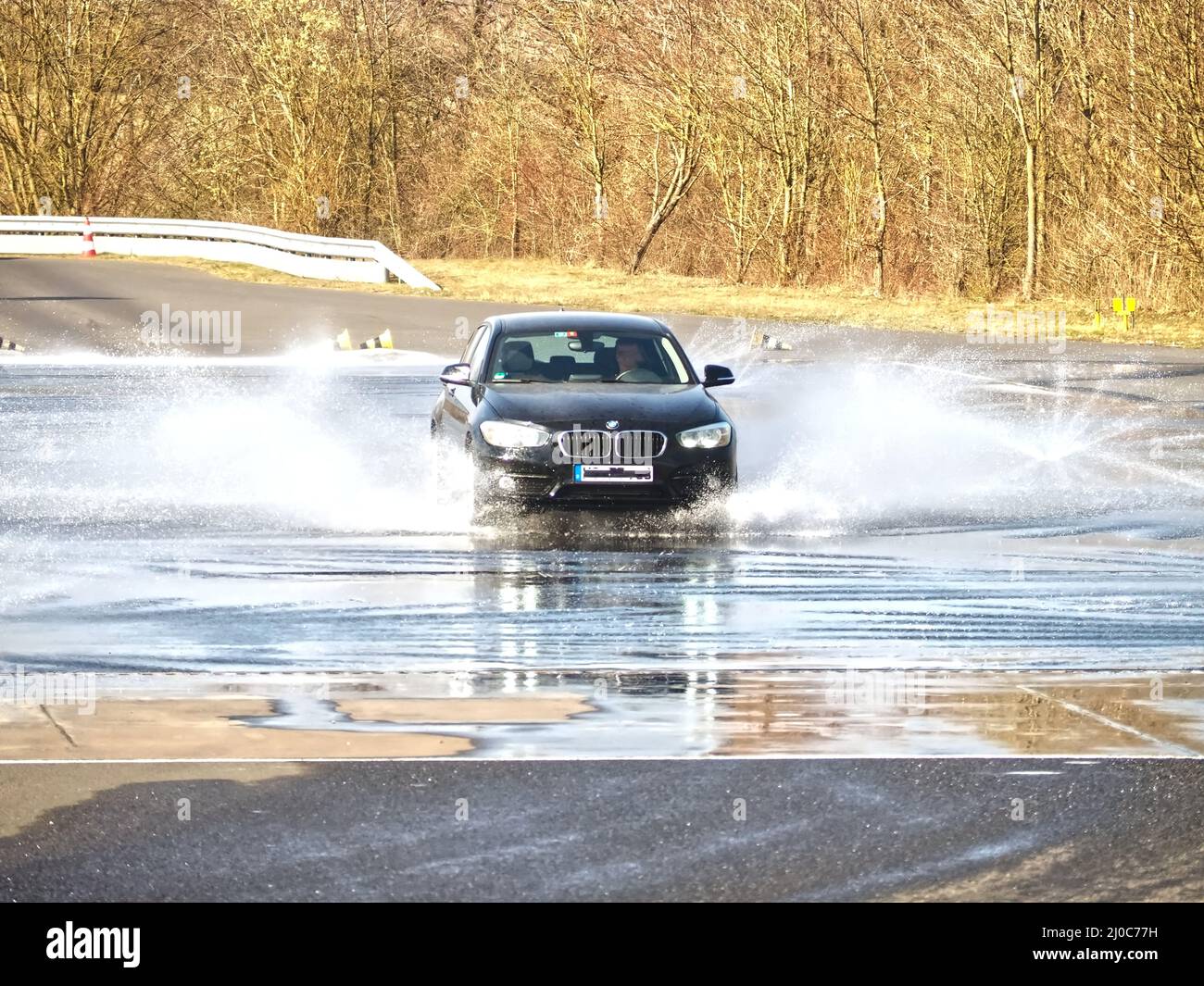 ADAC driving safety training aquaplaning on a practice area Stock Photo ...