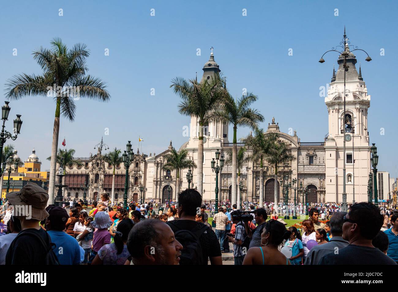 Group of people during a procession at Plaza de Armas, Cathedral of ...