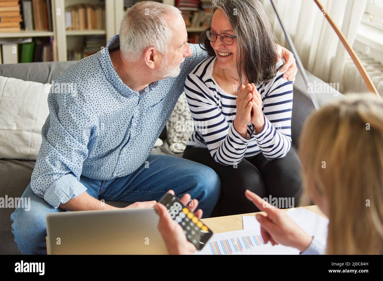 Senior couple is happy in the financial consultation about the return ...