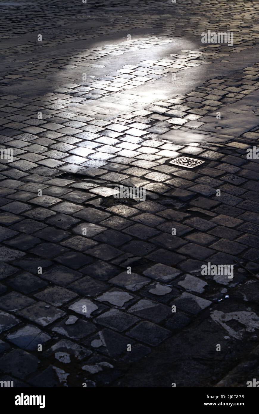 Vertical shot of a stone tiled ground on the street Stock Photo - Alamy