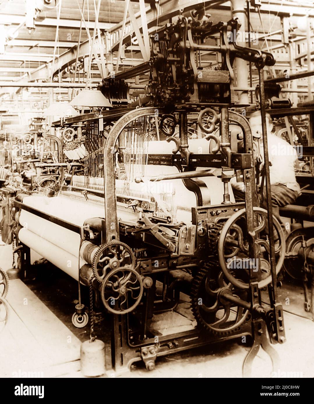 Plain coating loom in a woollen mill in Bradford, Yorkshire, late ...