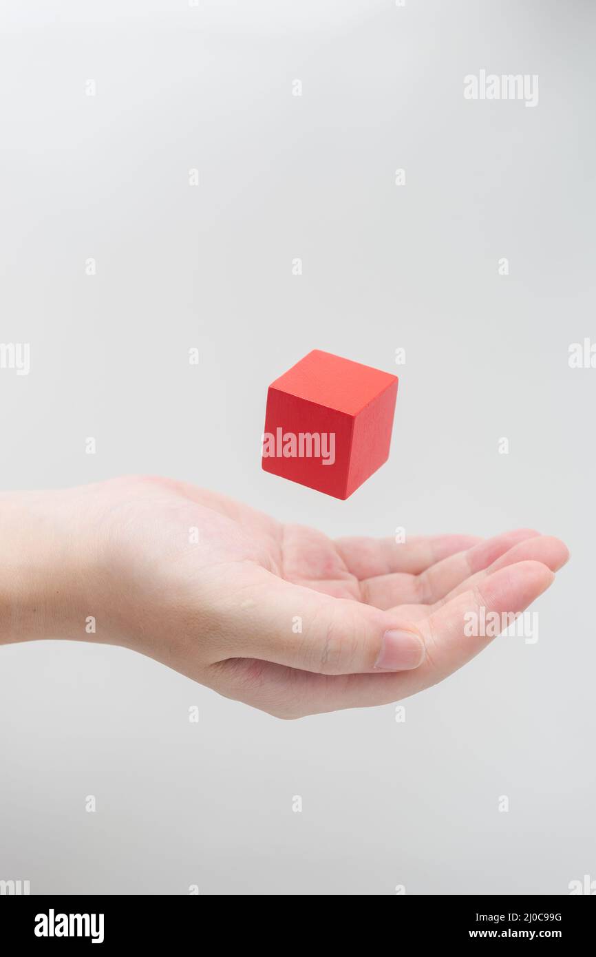 Surreal design concept - Abstract geometric real wooden cube float on ...