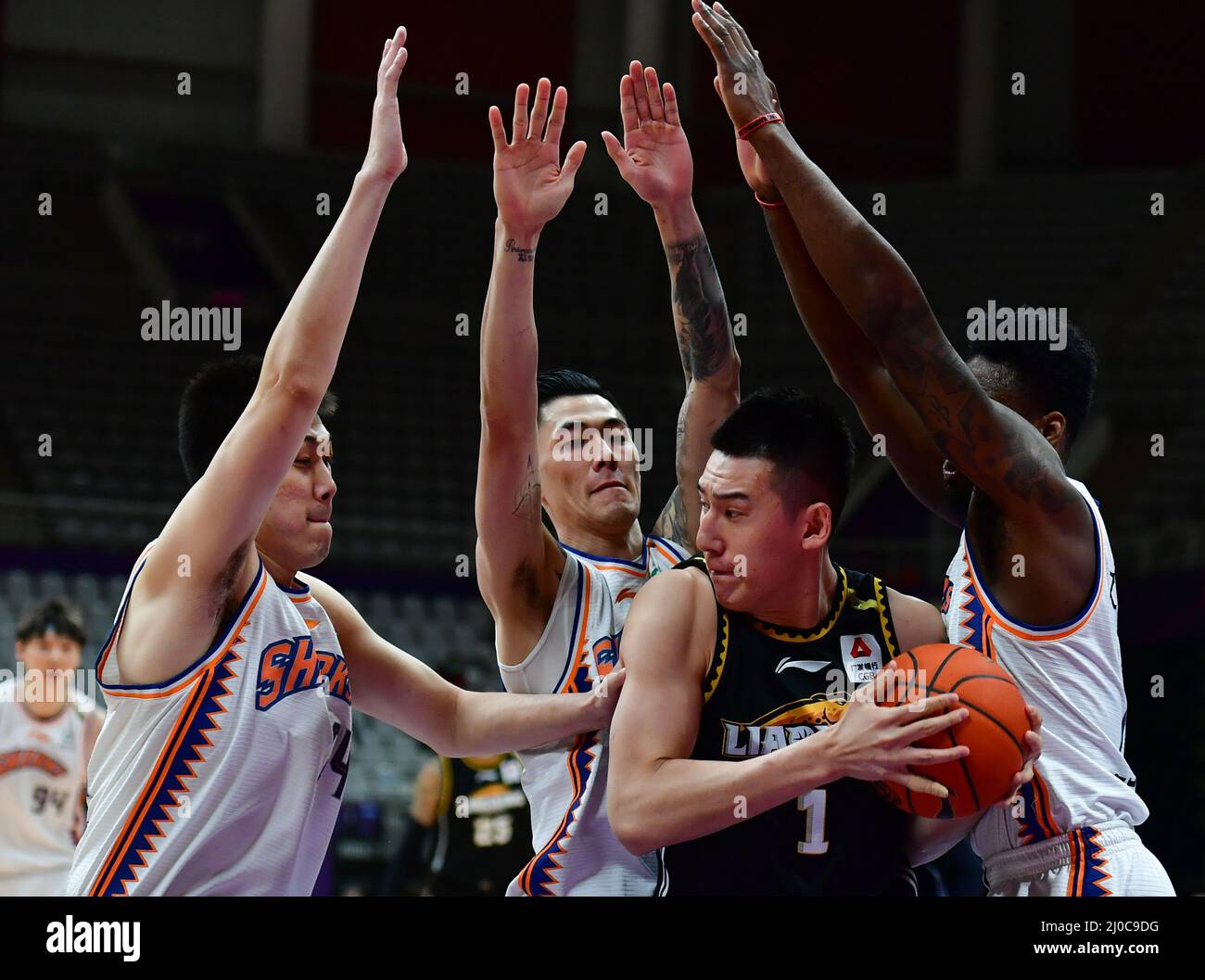 Shenyang, China. 18th Mar, 2022. Fu Hao (2nd R) of Liaoning Flying ...