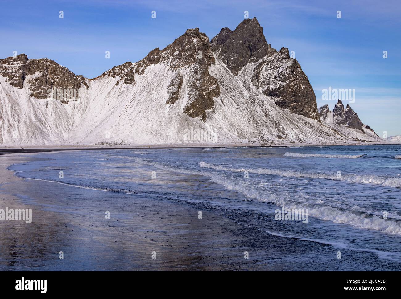 Vestrahorn mountain and dunes and black sand beach and sea at Stokksnes ...