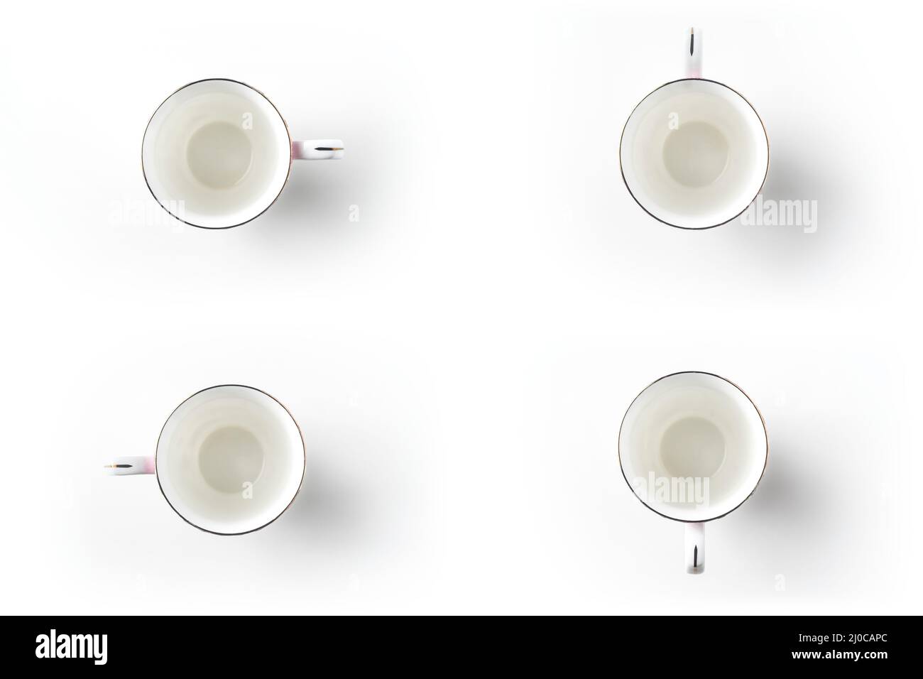 Top view of empty golden cup on white background desk for mockup Stock ...