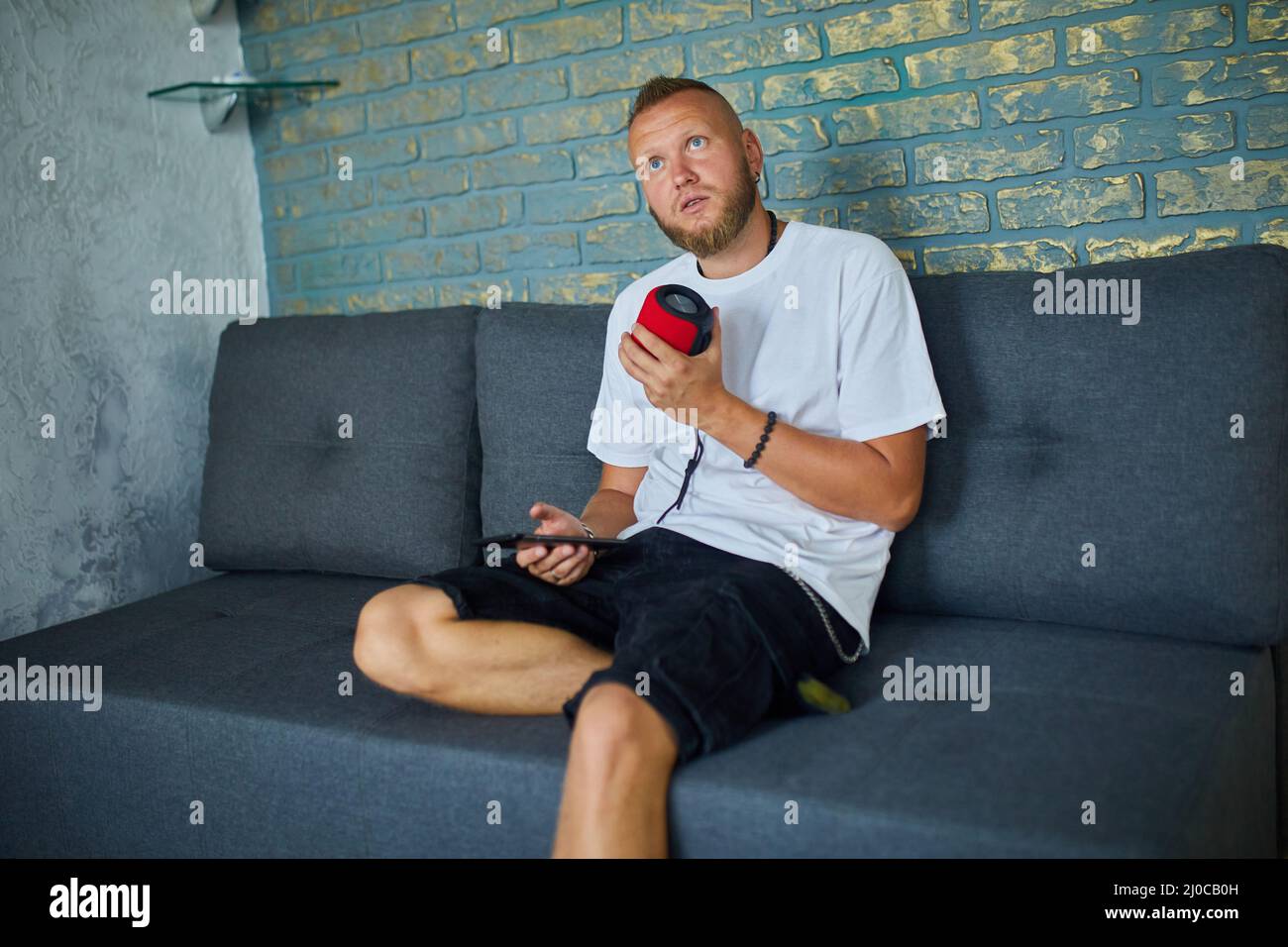 Male Testing Talking Smart Wireless Speaker Man Controlling Home